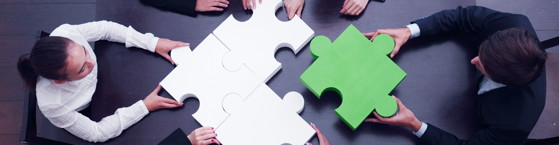 business team solving puzzle - Mediatelegal